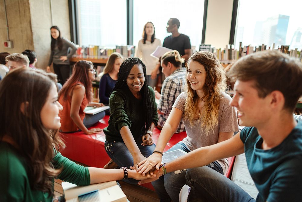 Diverse group young adults collaborating | Free Photo - rawpixel