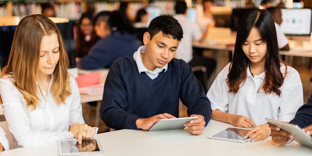 Students using tablets library. Diverse | Premium Photo - rawpixel