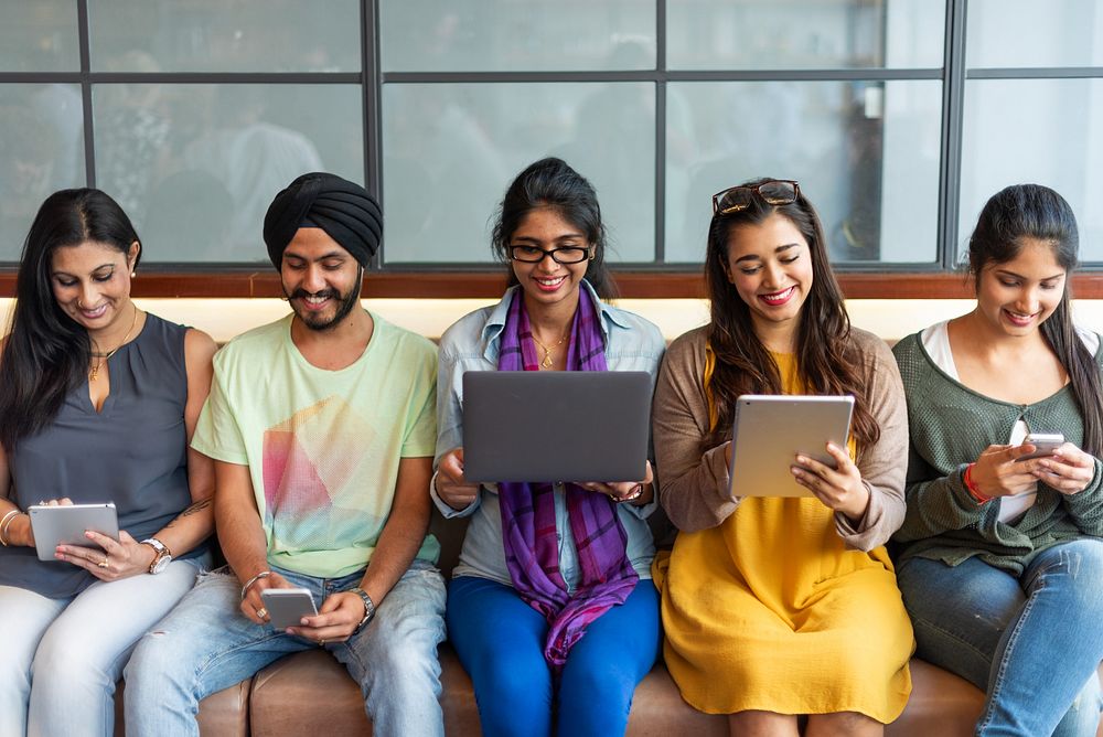Diverse group people using devices. | Free Photo - rawpixel