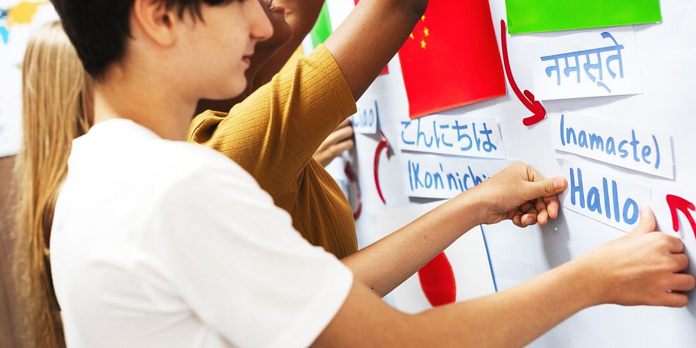 Students placing multilingual greeting cards | Premium Photo - rawpixel