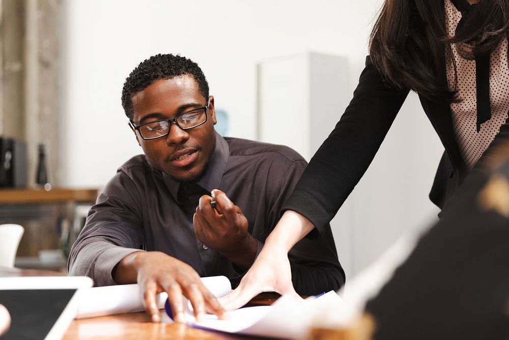 Two professionals collaborating desk. man | Free Photo - rawpixel