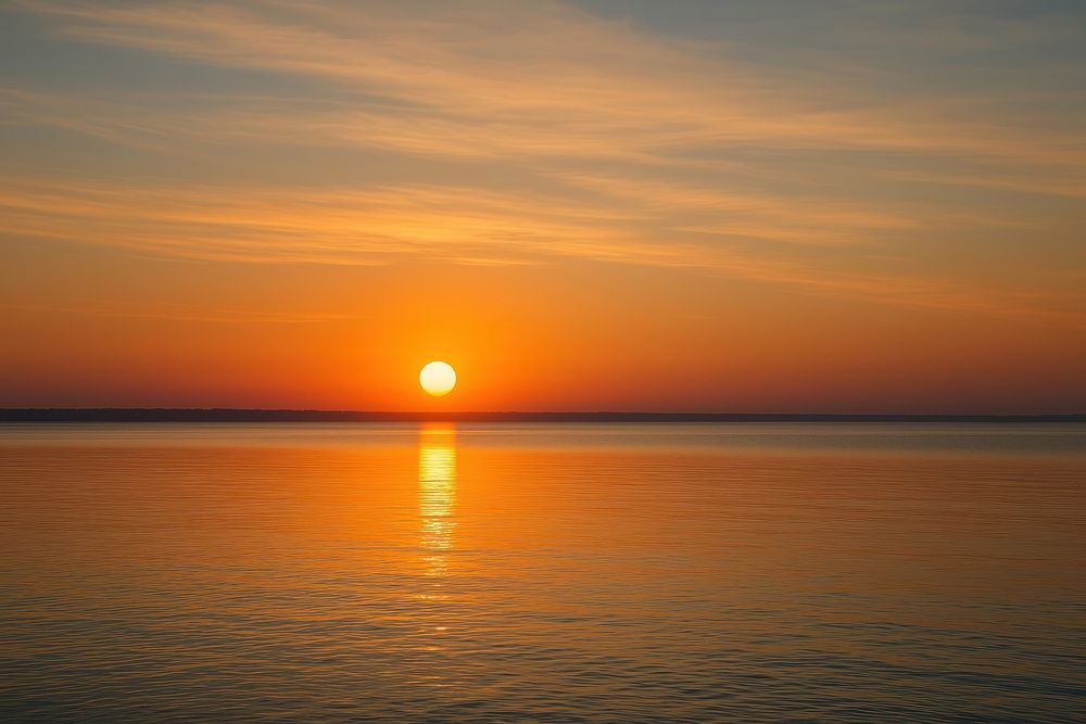 Serene sunset over calm water | Free Photo - rawpixel
