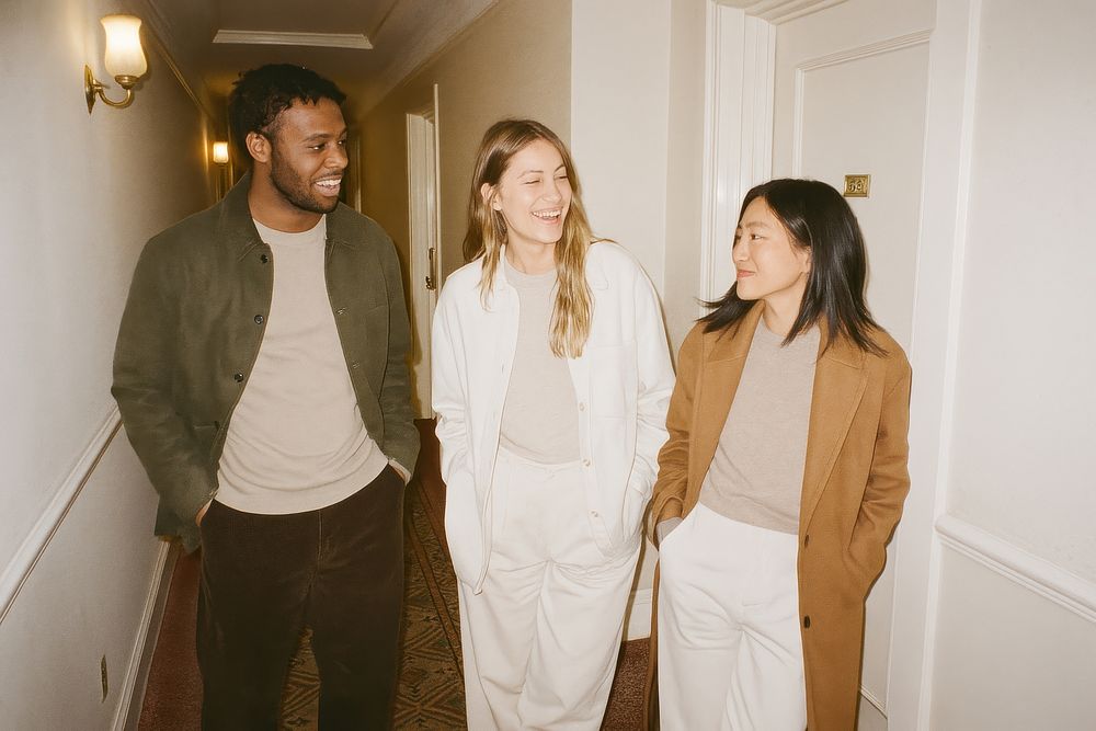 Diverse friends hallway conversation | Free Photo - rawpixel