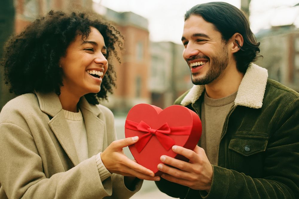 Couple exchanging heart gift. | Free Photo - rawpixel