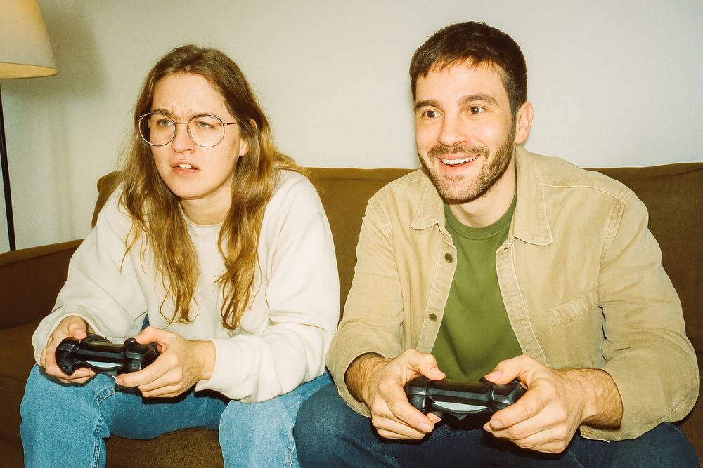 Couple gaming fun together. | Free Photo - rawpixel