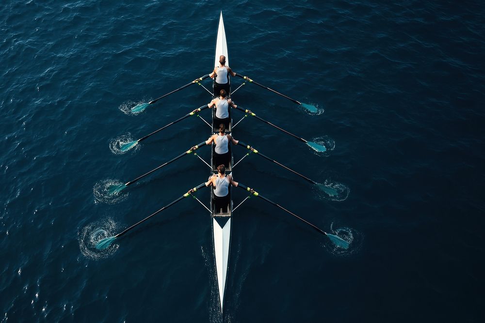 Team rowing in synchronized harmony. | Free Photo - rawpixel