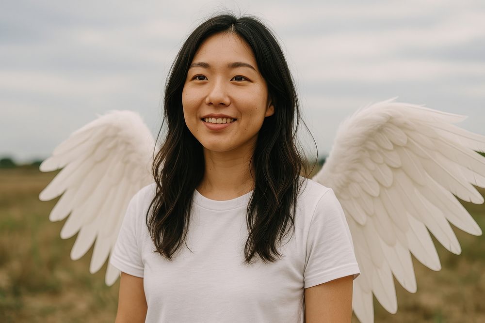 Smiling angel in open field | Free Photo - rawpixel