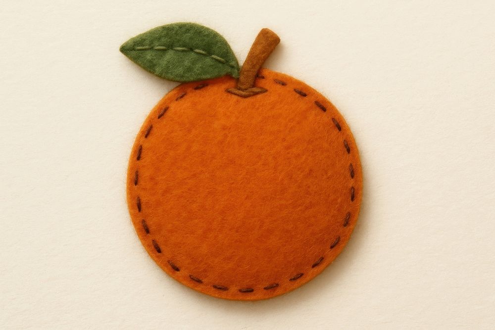 Felt orange with green leaf | Free Photo - rawpixel