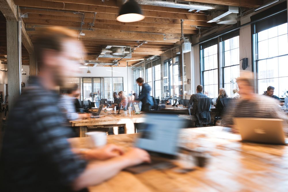 Startup team working shared desks | Free Photo - rawpixel