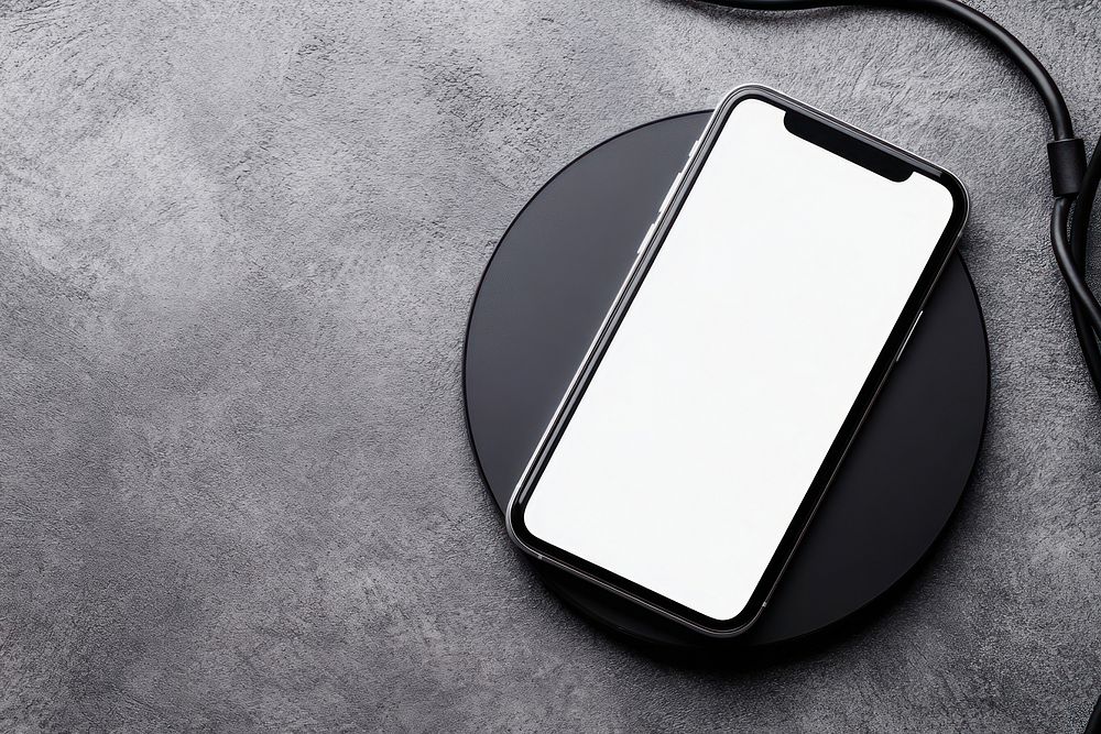 Smartphone charging screen pad. | Free Photo - rawpixel