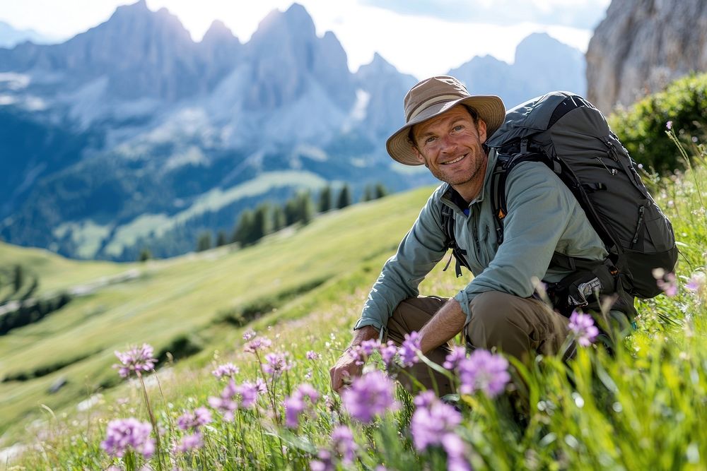 An explorer hiking grassy slopes | Free Photo - rawpixel