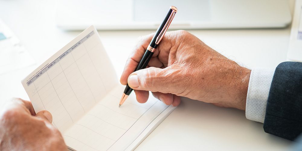 Close-up hand writing notebook pen. | Free Photo - rawpixel
