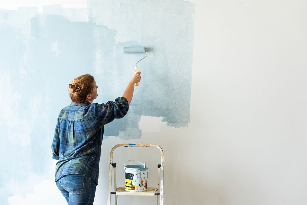 Person painting wall light blue | Free Photo - rawpixel