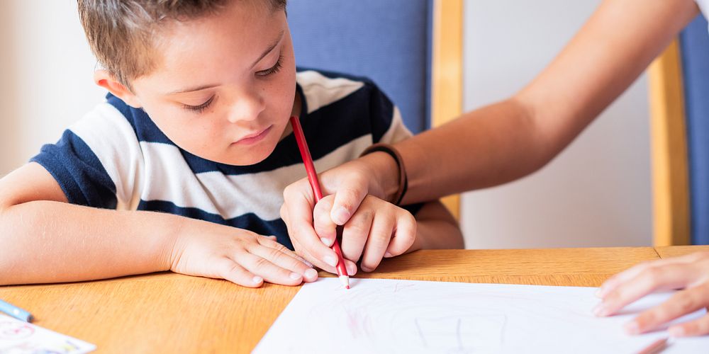 Child drawing assistance, focusing creativity | Free Photo - rawpixel