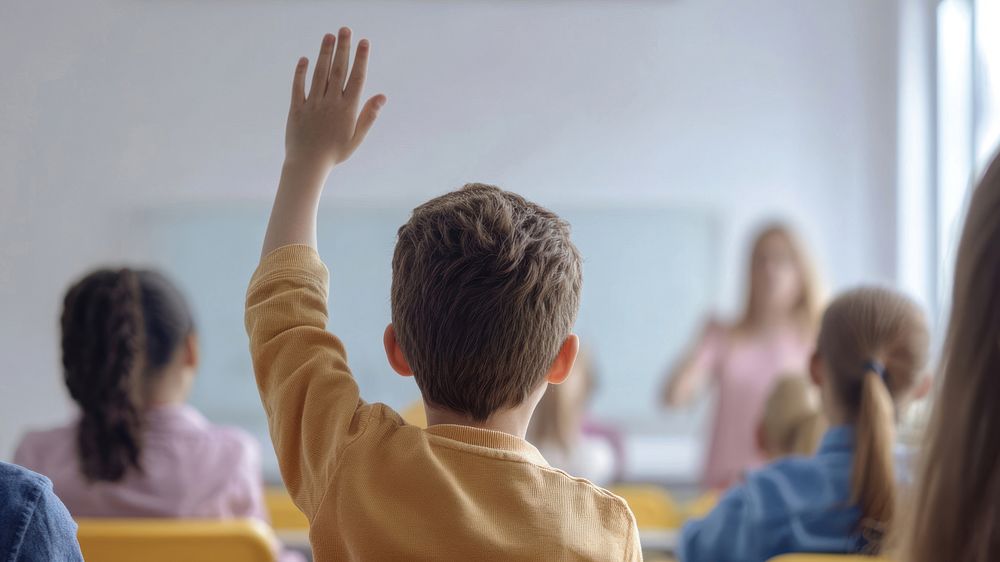 Boy raising his hand students | Free Photo - rawpixel
