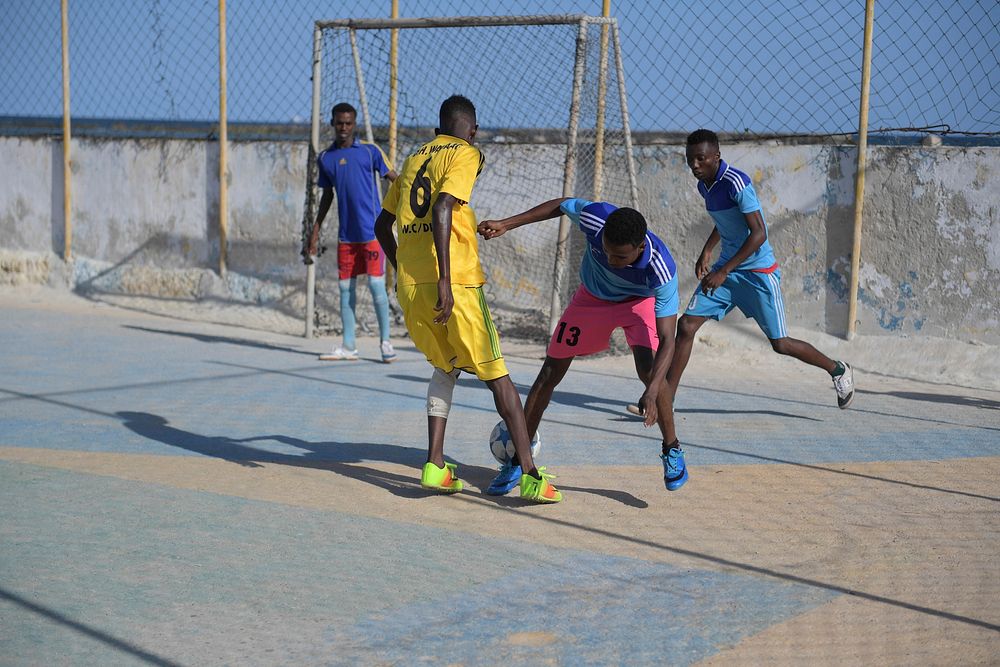 Somali youth play soccer Mogadishu | Free Photo - rawpixel