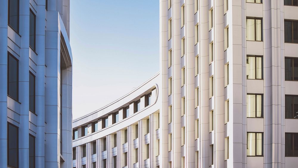 Long white building facades concrete | Free Photo - rawpixel