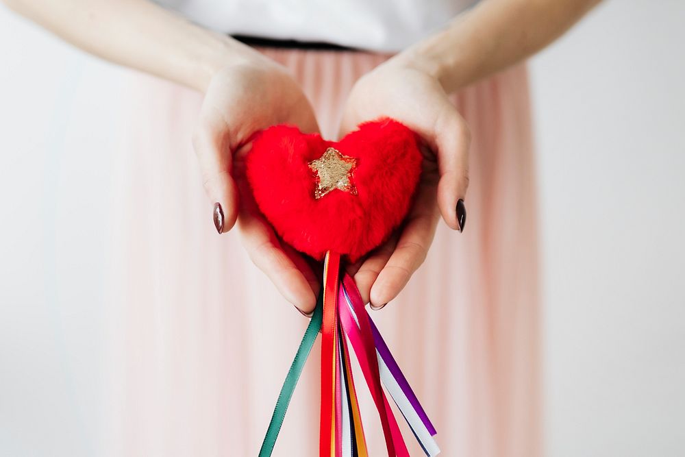 Woman holding red furry heart | Free Photo - rawpixel