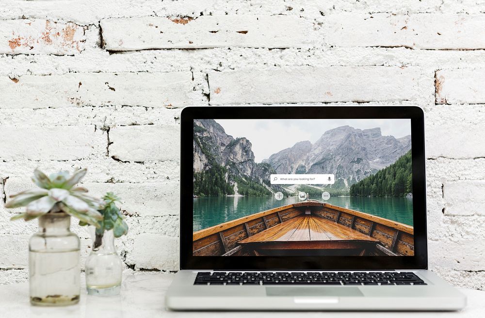 Laptop screen, brick wall workspace | Premium Photo - rawpixel