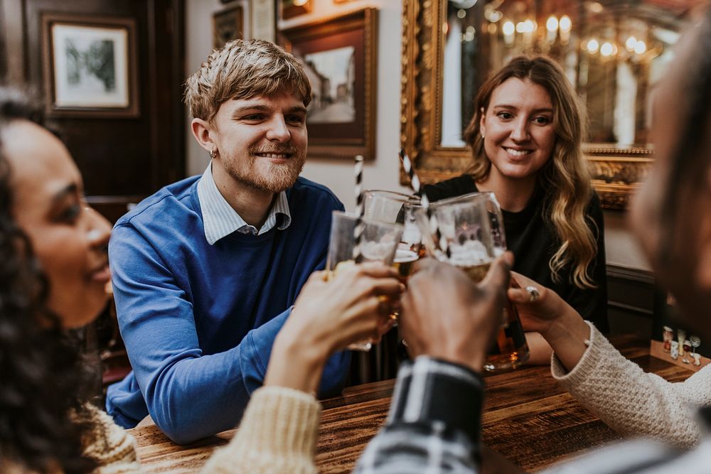 Diverse friends at the pub | Premium Photo - rawpixel