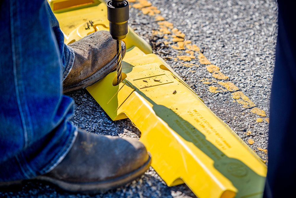 Traffic delineator installation | Free Photo - rawpixel