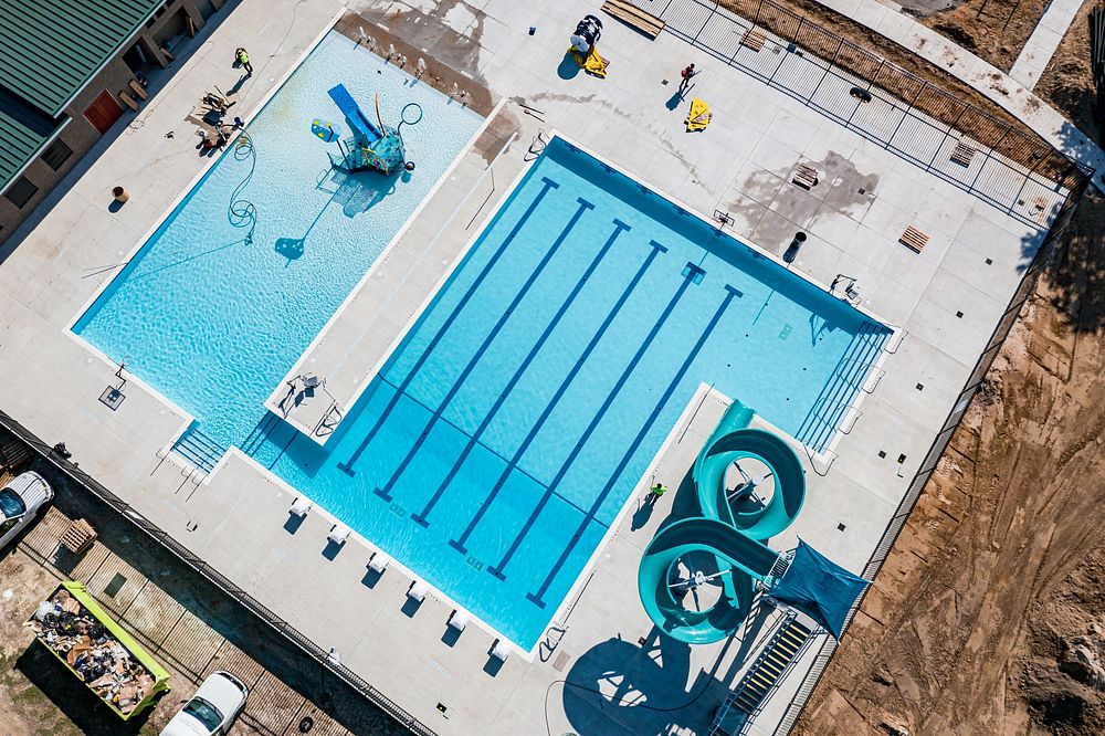 Community pool construction | Free Photo - rawpixel