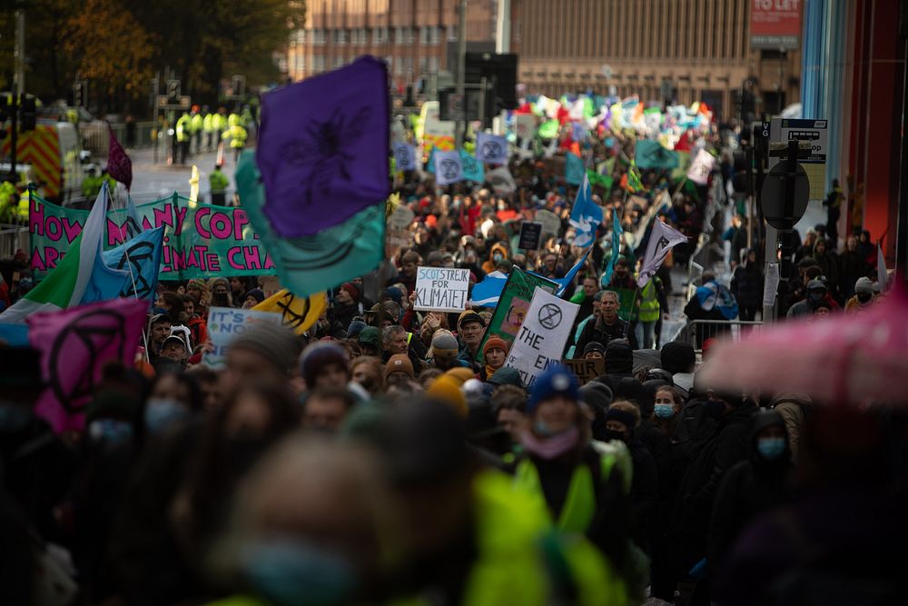 Climate activists bring message "Insure | Free Photo - rawpixel