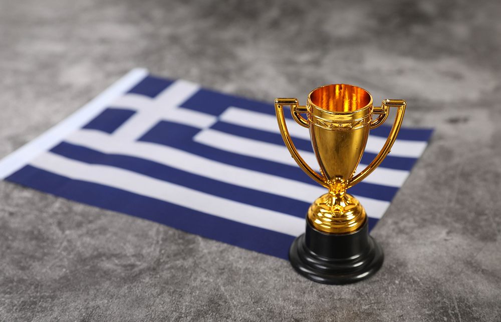 Golden trophy flag Greece | Free Photo - rawpixel