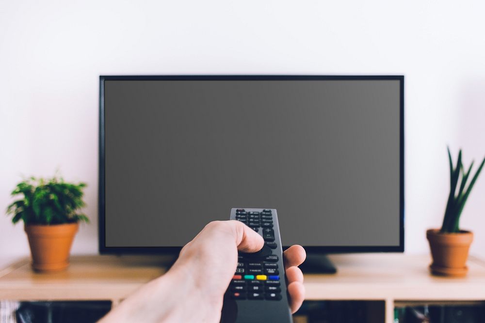 Television screen with remote control | Premium Photo - rawpixel