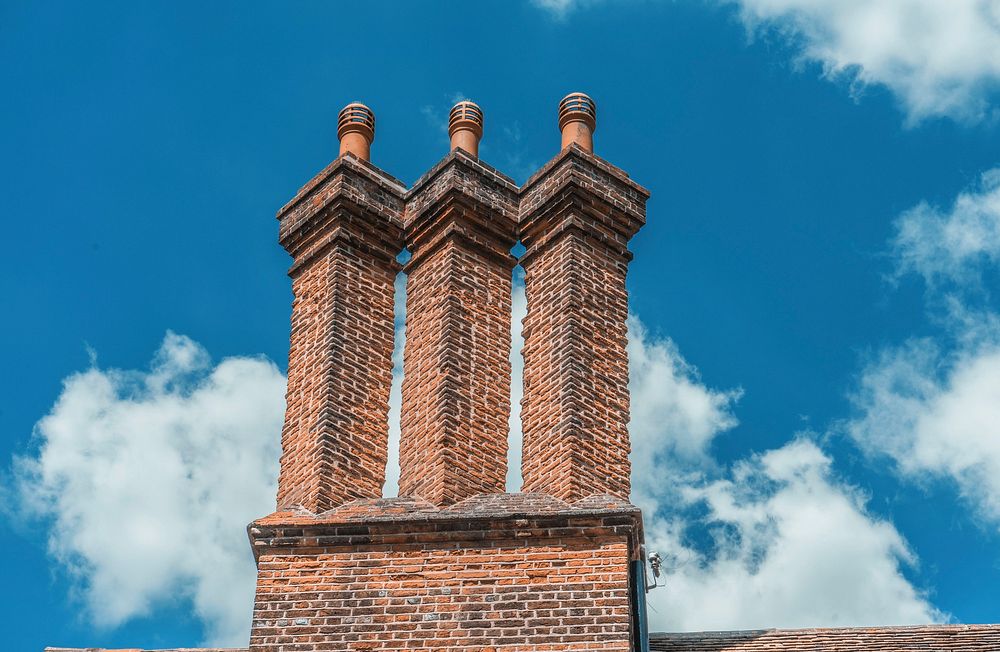 Medieval brick chimneys, historical building. | Free Photo - rawpixel