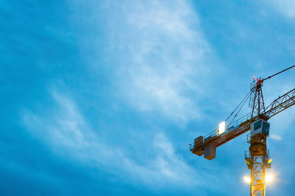 Construction tower, blue background | Premium Photo - rawpixel