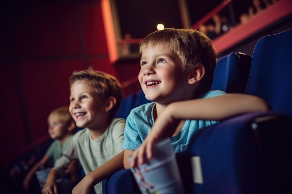 Watching smiling child movie. AI | Free Photo - rawpixel