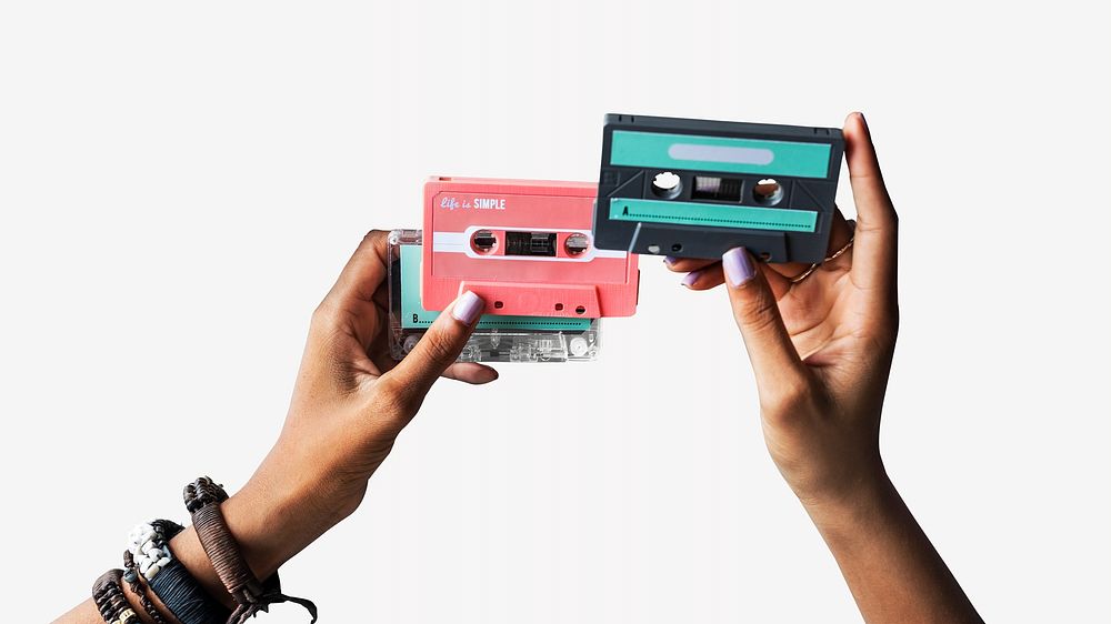 Hands holding cassette tape, isolated | Free Photo - rawpixel