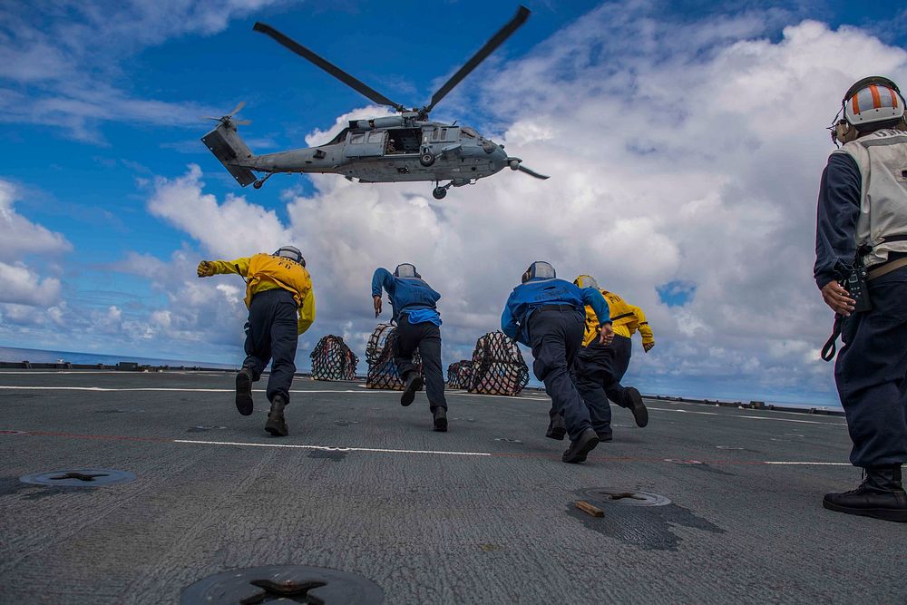U.S. Sailors run to grab | Free Photo - rawpixel