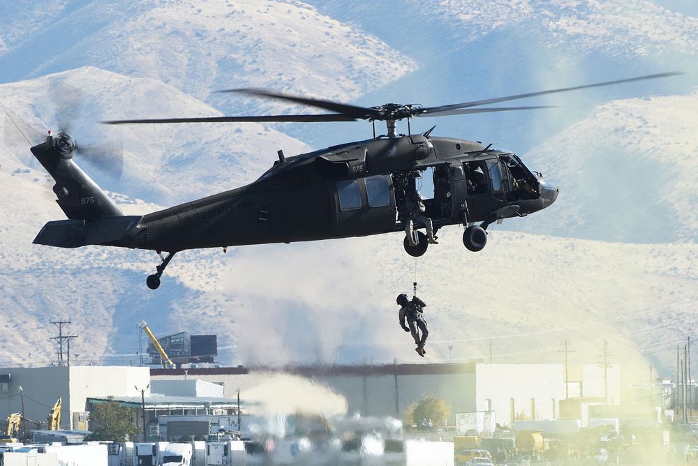 U.S. Soldier is lowered UH-60 | Free Photo - rawpixel