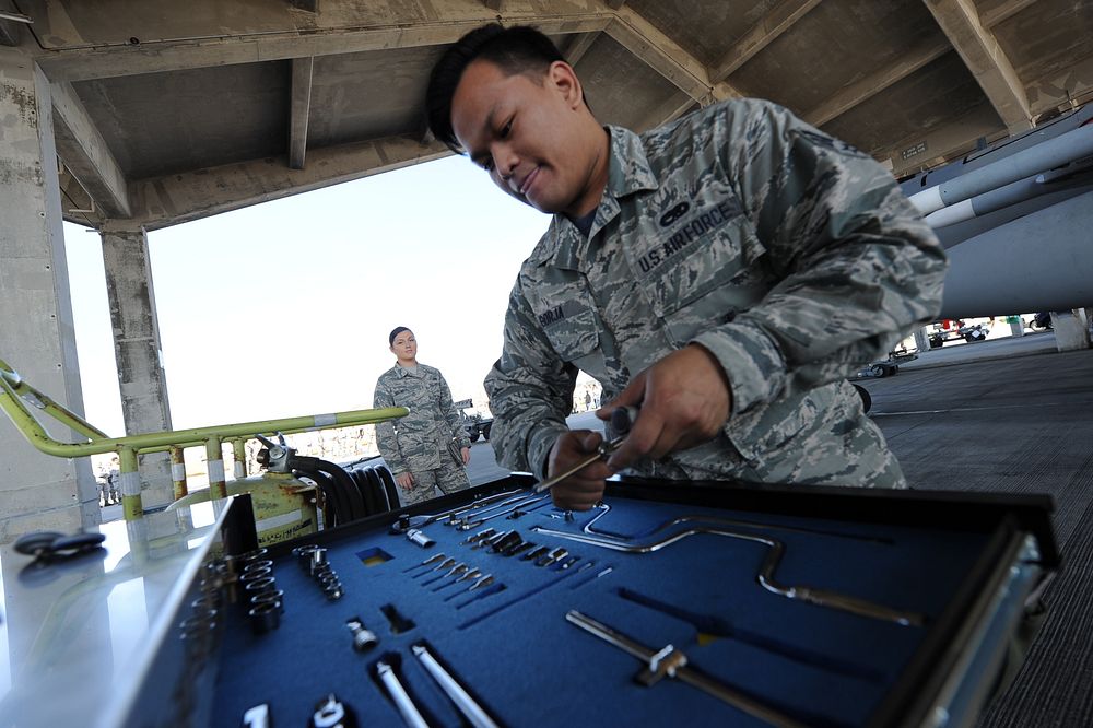 A Weapons Load Team Member Assigned To The 44th Aircraft Maintenance ...