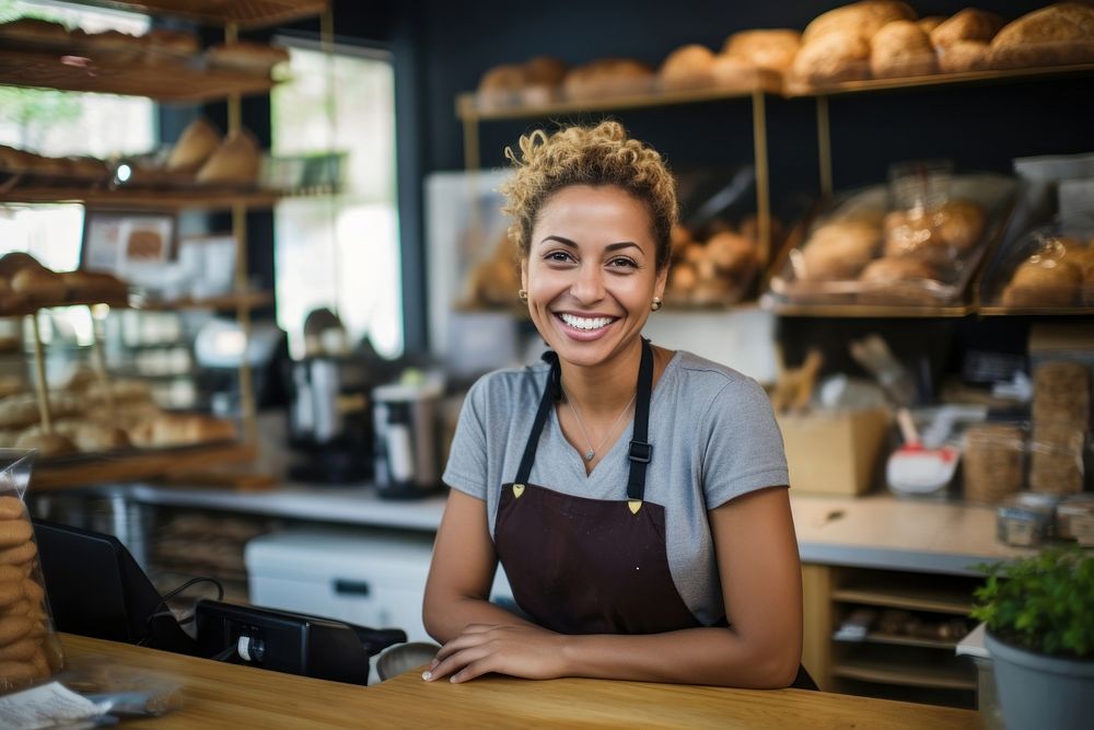 Female business owner smiling working | Free Photo - rawpixel