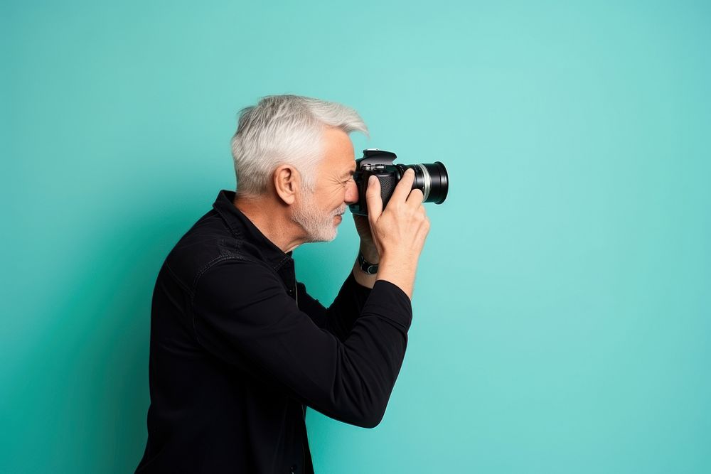 Senior adult photographer. AI generated | Free Photo - rawpixel