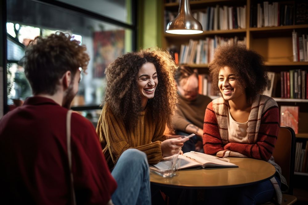 Friends discussing book laughing adult | Free Photo - rawpixel