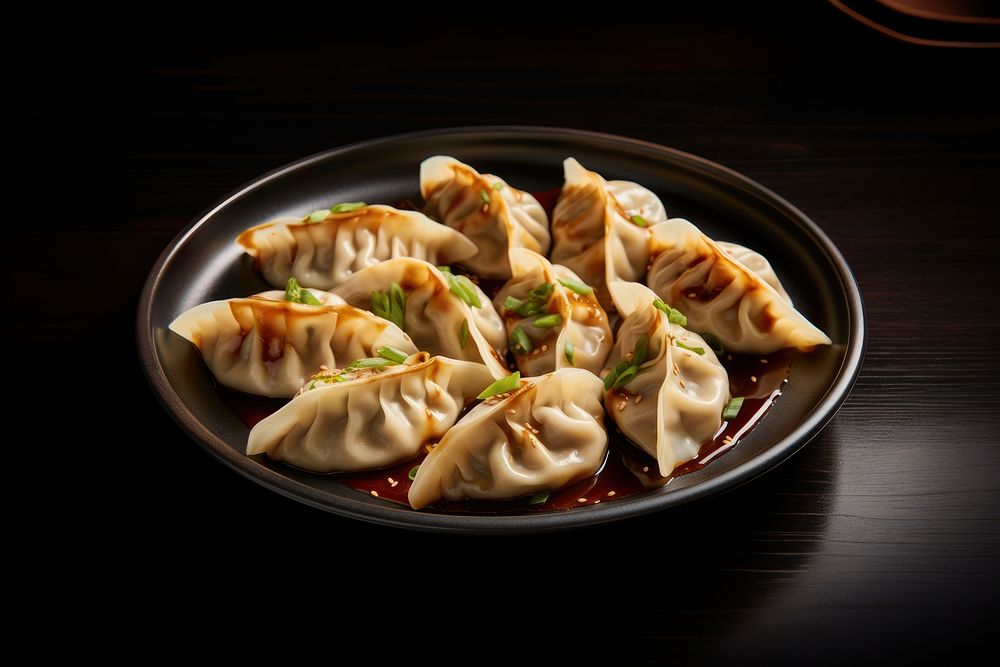 Dumpling plate food meal. AI | Premium Photo - rawpixel