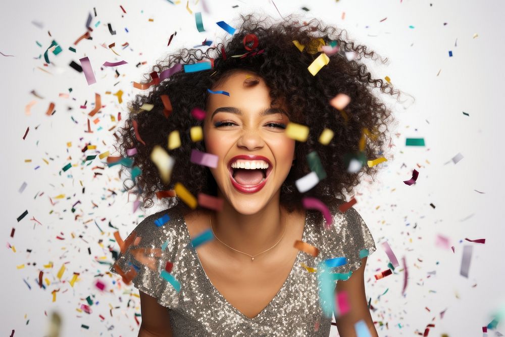 Celebrating laughing confetti smile. | Premium Photo - rawpixel