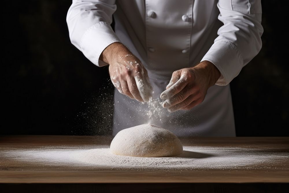 Sprinkling cooking flour dough. AI | Premium Photo - rawpixel