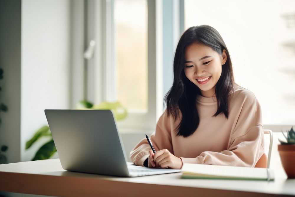 Smiling asian woman laptop computer | Free Photo - rawpixel