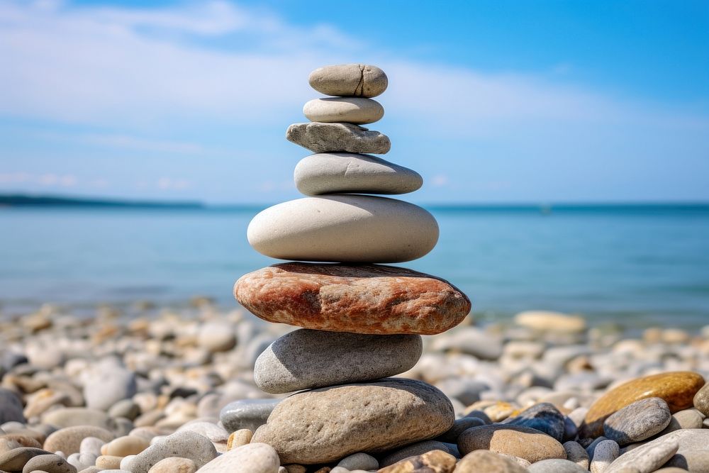 Balance pebble beach rock. | Free Photo - rawpixel