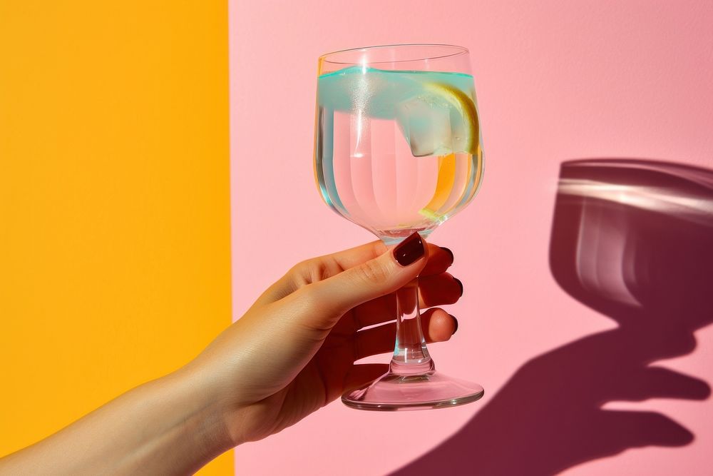 Hand holding cocktail glass drink | Free Photo - rawpixel