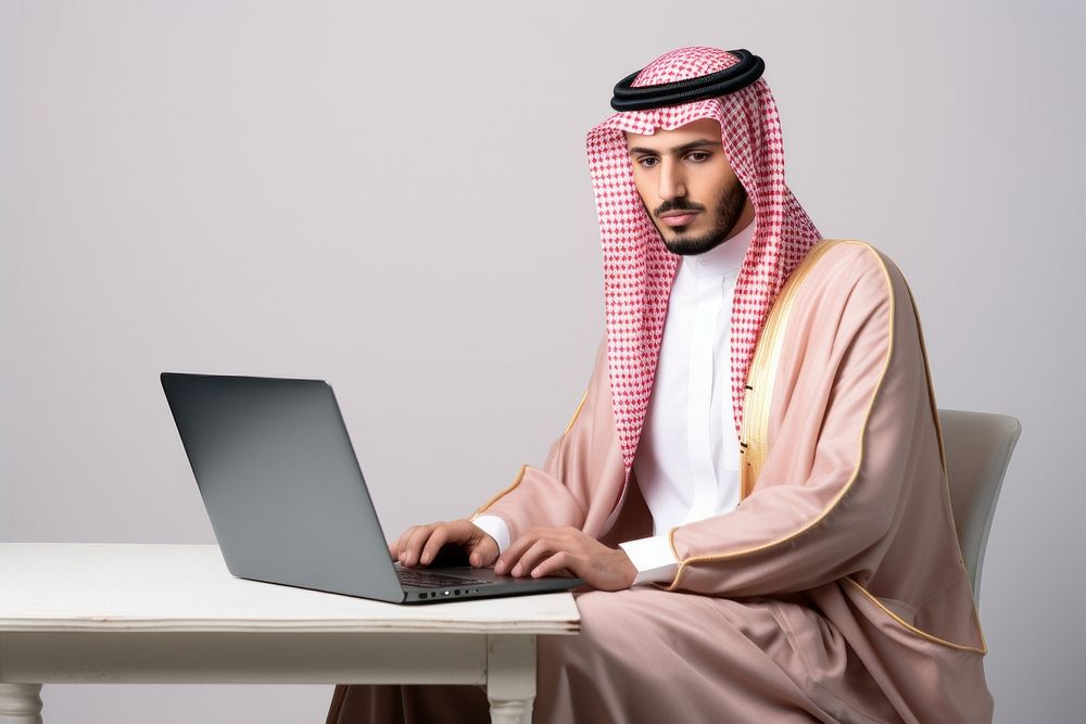 Saudi laptop computer sitting | Free Photo - rawpixel