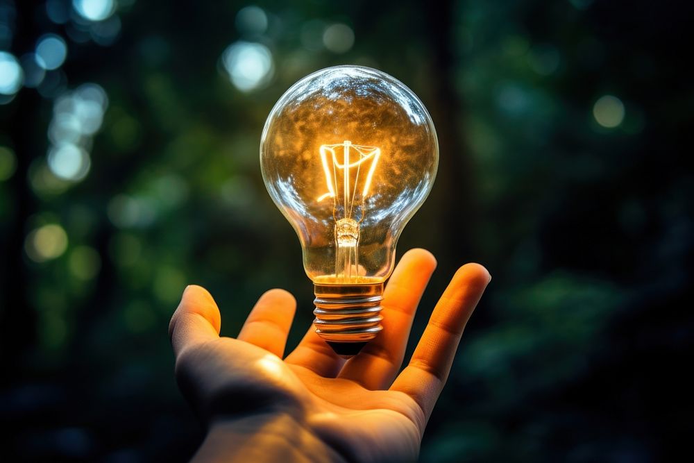 Light bulb glowing hand lightbulb | Free Photo - rawpixel