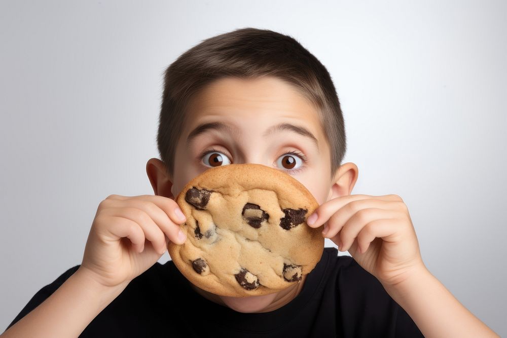 Child eating cookie baby confectionery | Premium Photo - rawpixel