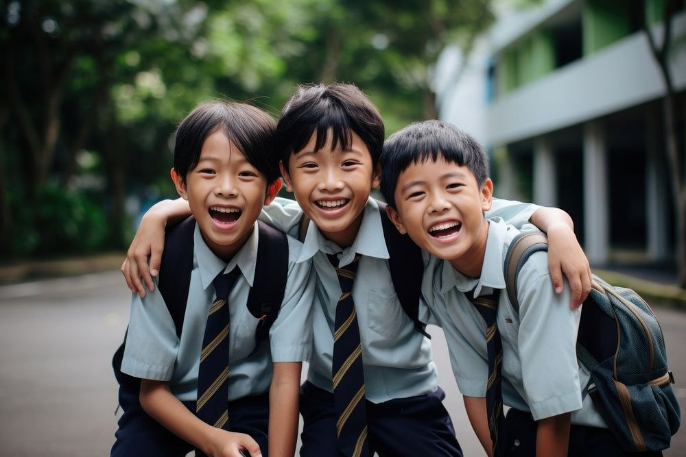 Southeast Asian students laughing school | Free Photo - rawpixel