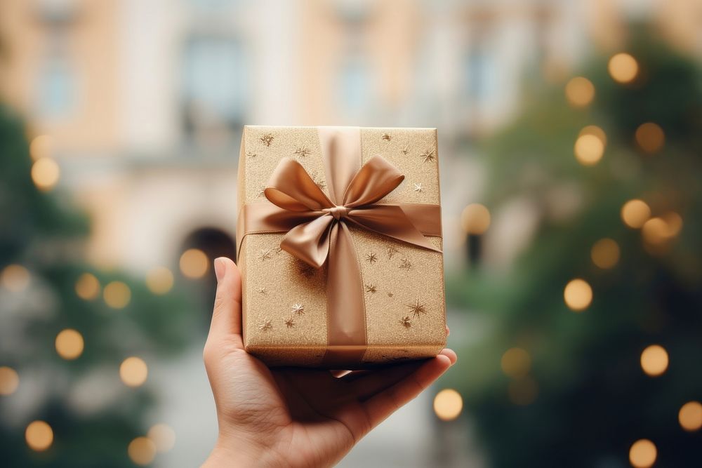 Hand holding gift box hand | Premium Photo - rawpixel
